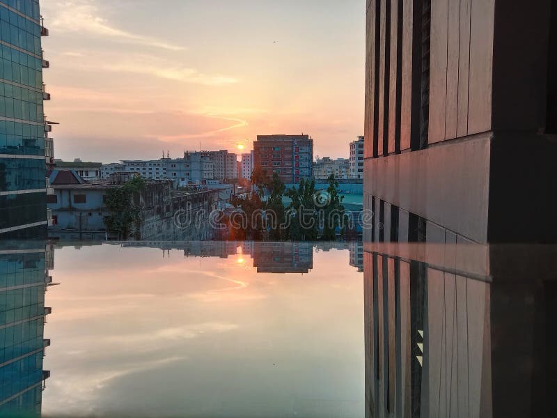 Reflection of a Drawning Sun Stock Photo - Image of sunset, dusk: 259872012