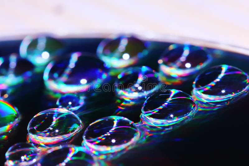 Drop on Cd in Close Up for Beautiful Light Background Stock Photo ...