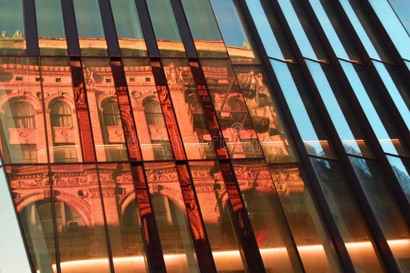 Reflection of the Facade of the Building in the Windows of the Building ...