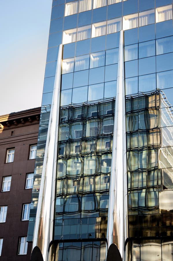 Reflection in Facade of Shining Modern Glass Building Stock Photo ...