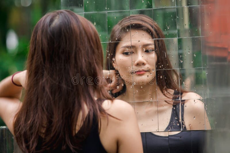 The Reflection of a Woman in the Mirror Stock Photo - Image of eyes ...