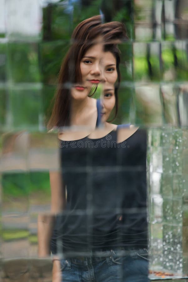 The Reflection of a Woman in the Mirror Stock Image - Image of eyes ...