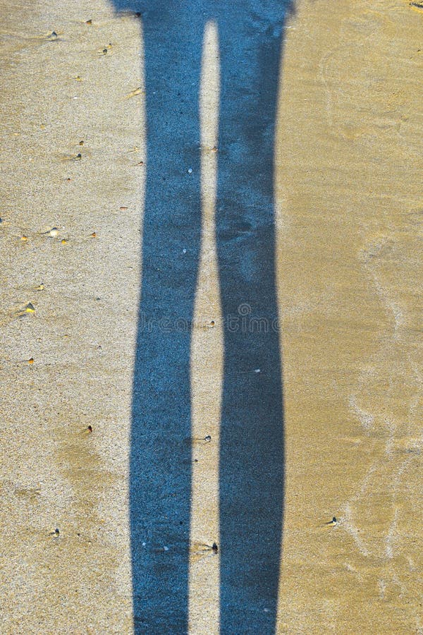 Reflection of Feet on Sand by Sea. Sunny Shadow of Feet on Wet Sand ...