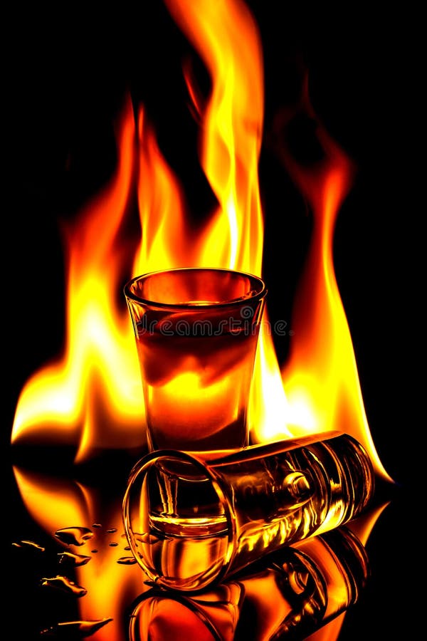 Reflection of Fire and Glassware on a Dark Background Stock Image ...