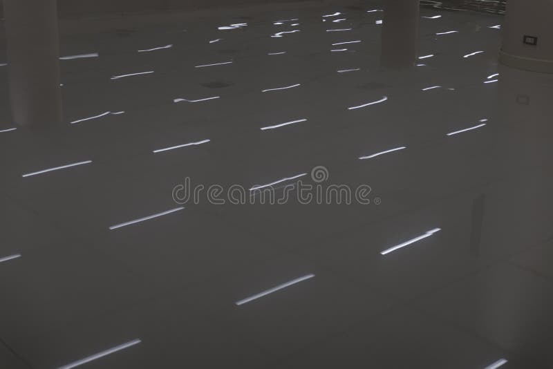 Reflection of Fluorescent Bulb on Tile Floor Stock Image - Image of ...