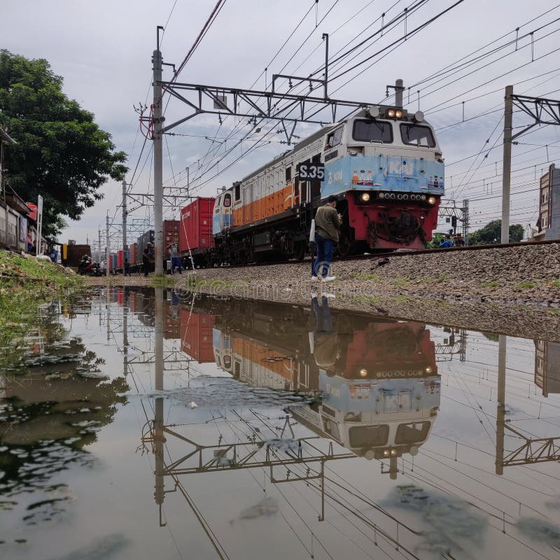 Reflection of the Freight Train in Puddle Stock Image - Image of speed ...