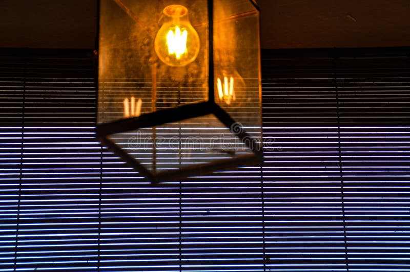 Reflection in a glass box stock image. Image of bulbs - 117041609