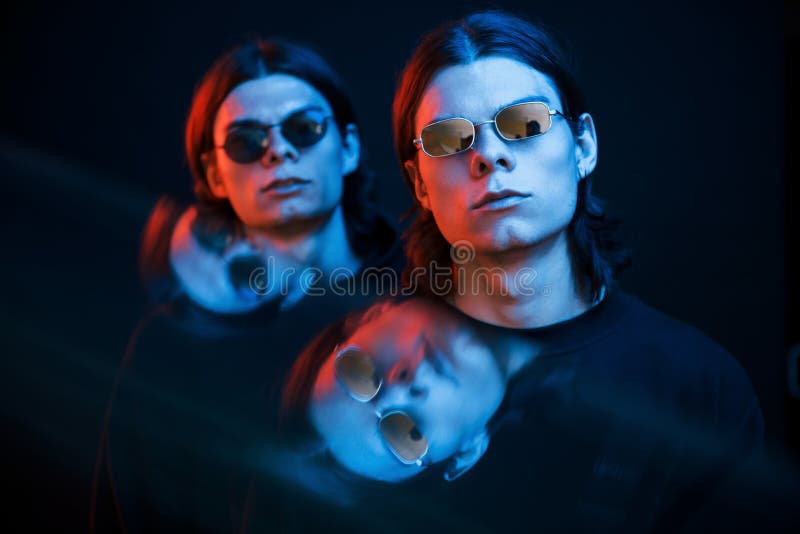 Reflection in the Glass at the Left Side. Portrait of Twin Brothers ...