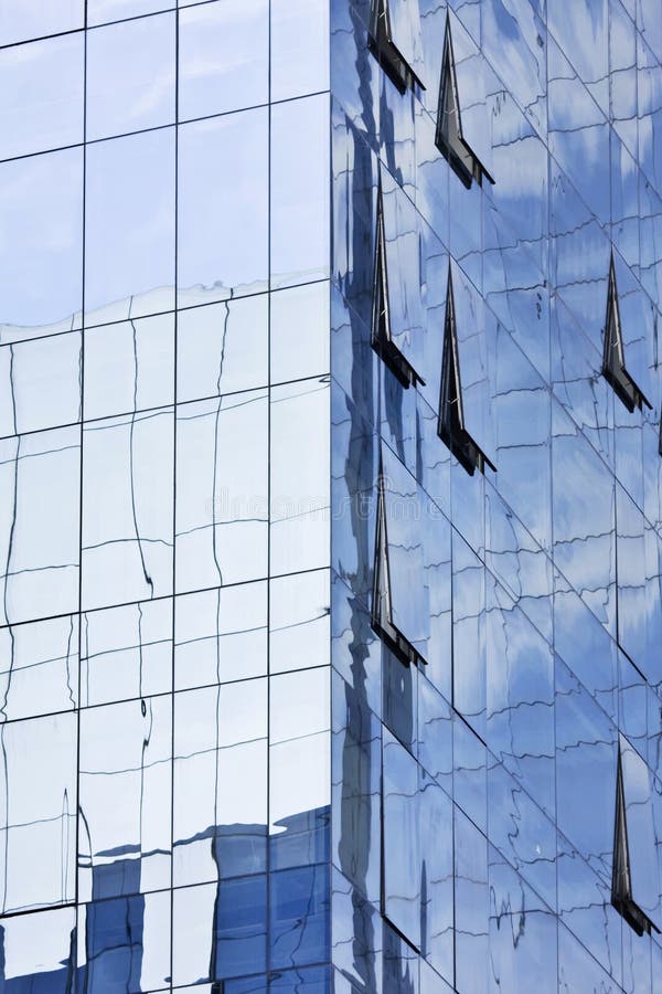 Reflection in the Glass Surface of a Skyscraper Stock Photo - Image of ...