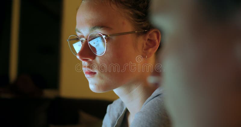 Reflection in Glasses of Woman Working on Computer Stock Footage ...