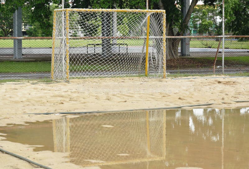 Reflection of Goal Frame on Water in Sand Handball Field in Park Stock ...