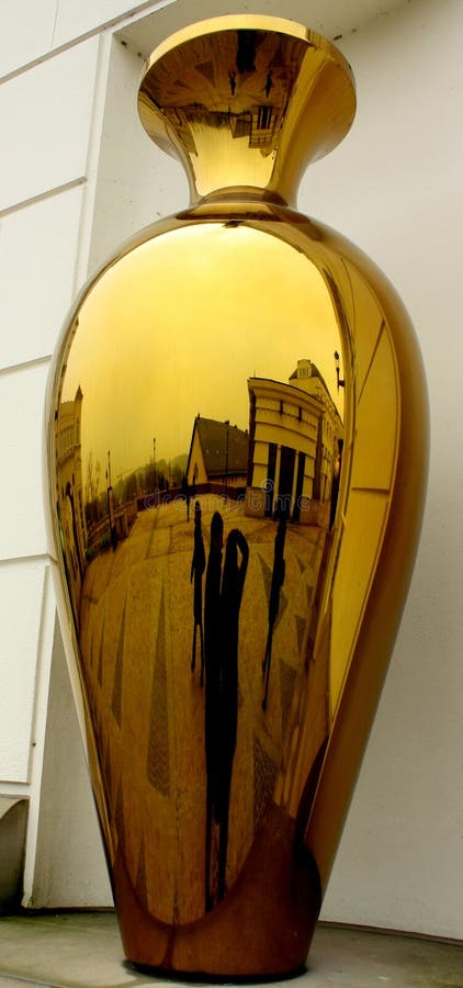 Reflection in gold stock image. Image of mirror, vase - 37498415