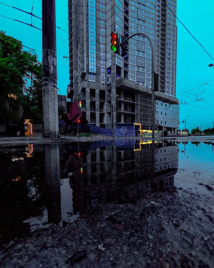 Reflection of a High Building and the Traffic Light, and Wires in the ...