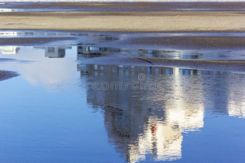 Reflection of a House in a Puddle in Sunny Weather. Early Spring Stock ...