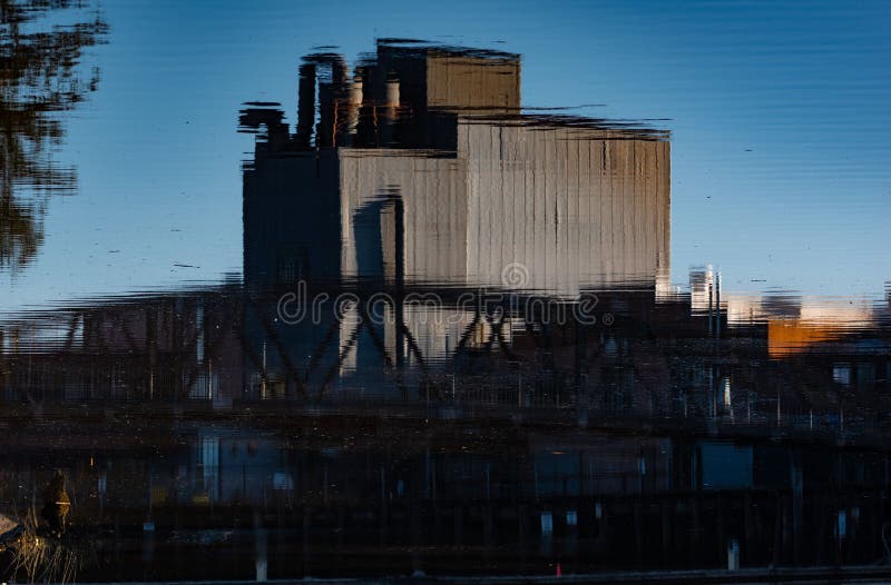 Reflection of an Industrial Building in a River Water Stock Image ...