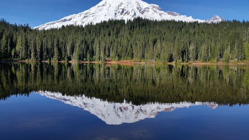 Reflection Lake views stock image. Image of snow, lake - 330872367
