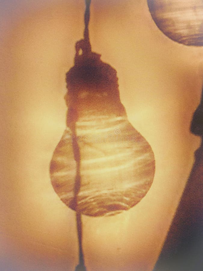 Reflection of a light bulb stock image. Image of painting - 158863219