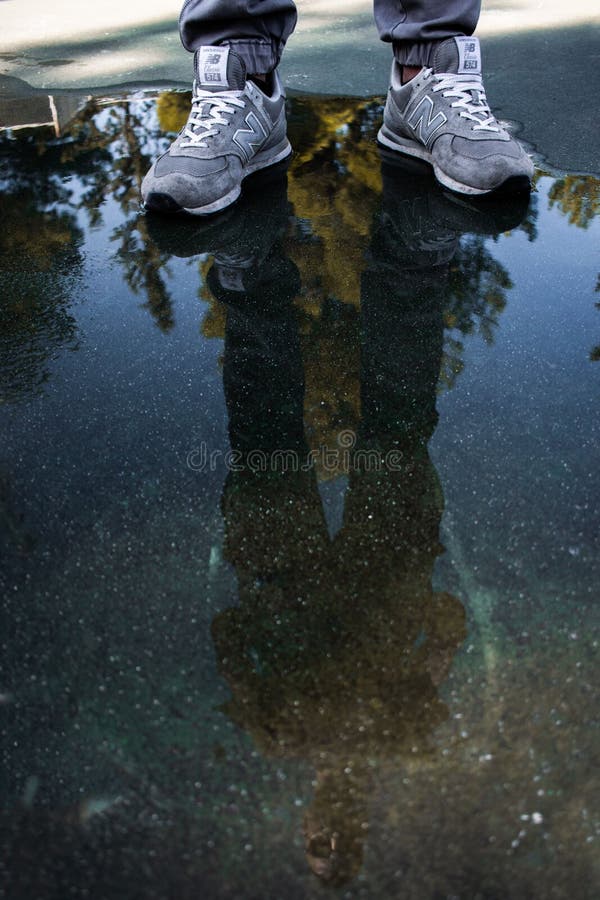 Reflection in a Puddle in Front of a Building Editorial Stock Image ...