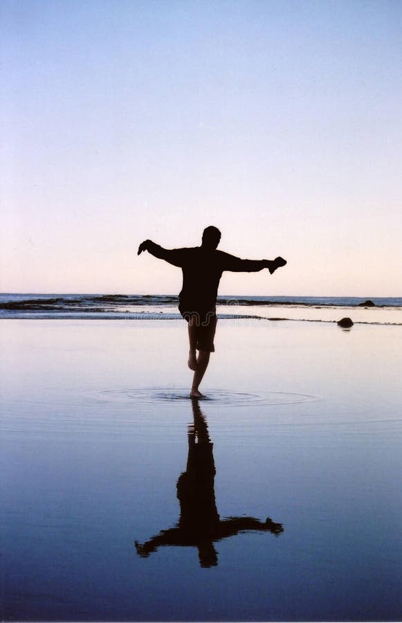 Reflection man stock image. Image of ocean, rock, dance - 4656101