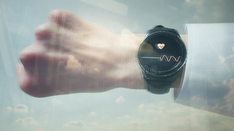 Reflection of a Man Checking His Pulse on a Smartwatch Stock Video ...