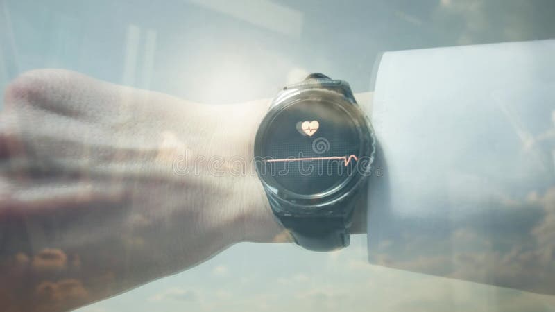 Reflection of a Man Checking His Pulse on a Smartwatch Stock Footage ...