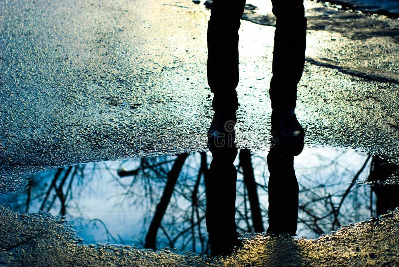 Reflection of Man Standing Near Puddle Stock Photo - Image of puddle ...