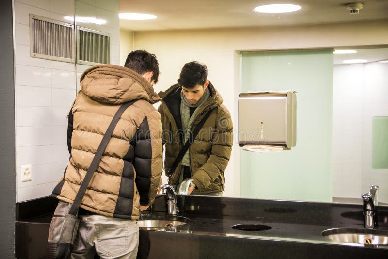 Reflection of Man Washing Hands in Bathroom Stock Image - Image of ...