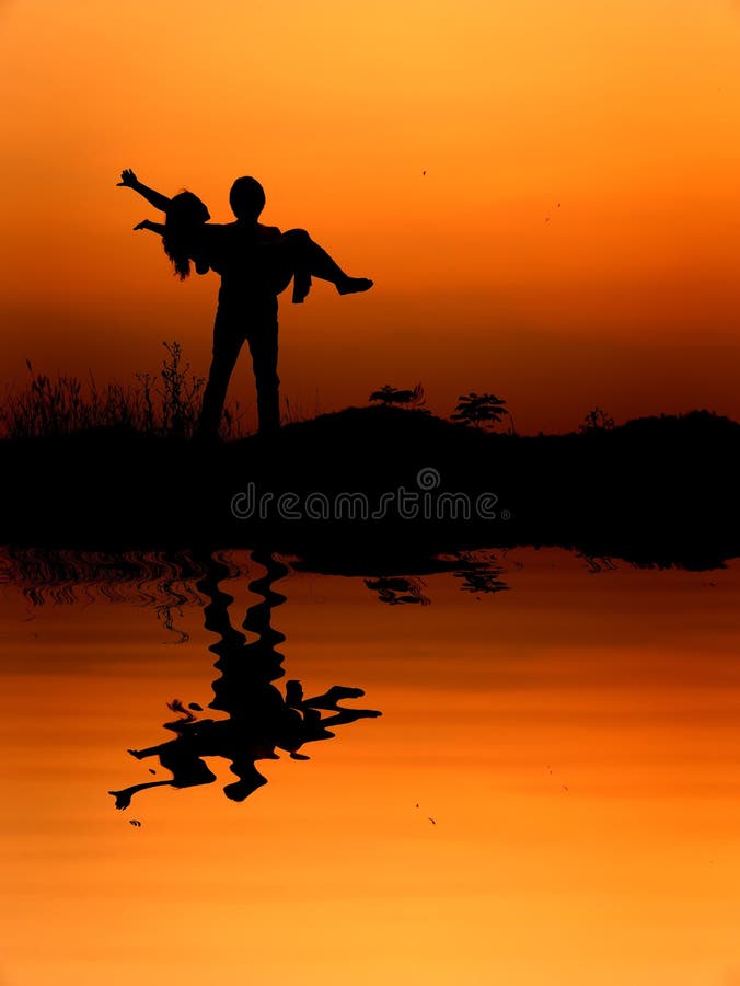 Reflection of Man and Woman Love Silhouette in Sunset Stock Photo ...