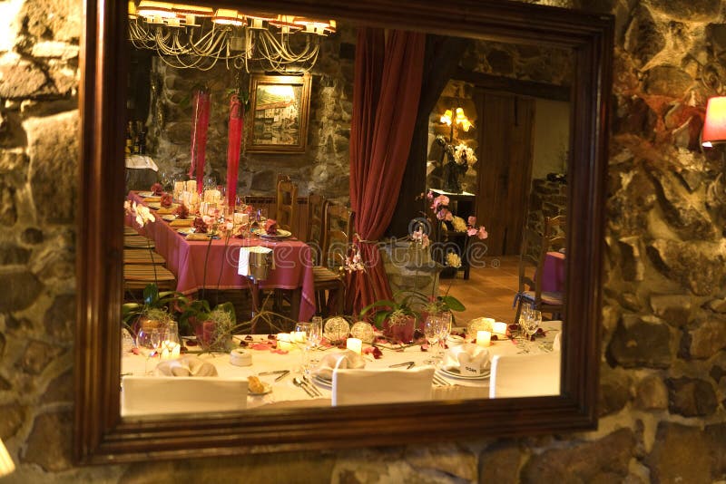 Reflection in a Mirror Inside a Dining Room. Stock Image - Image of ...