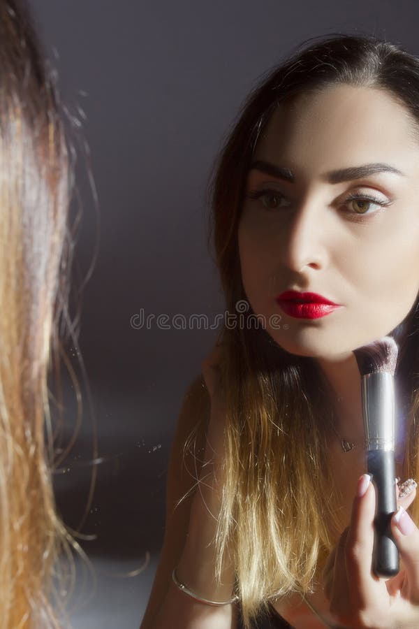 Reflection in the Mirror of a Young Woman Stock Photo - Image of care ...