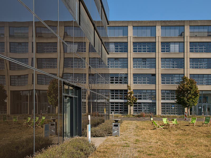 Reflection of a Modern Building in the Glass Wall of Another Building ...