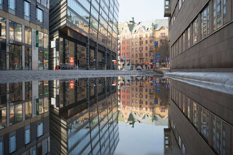 Reflection in a Puddle in Front of a Building Editorial Stock Image ...