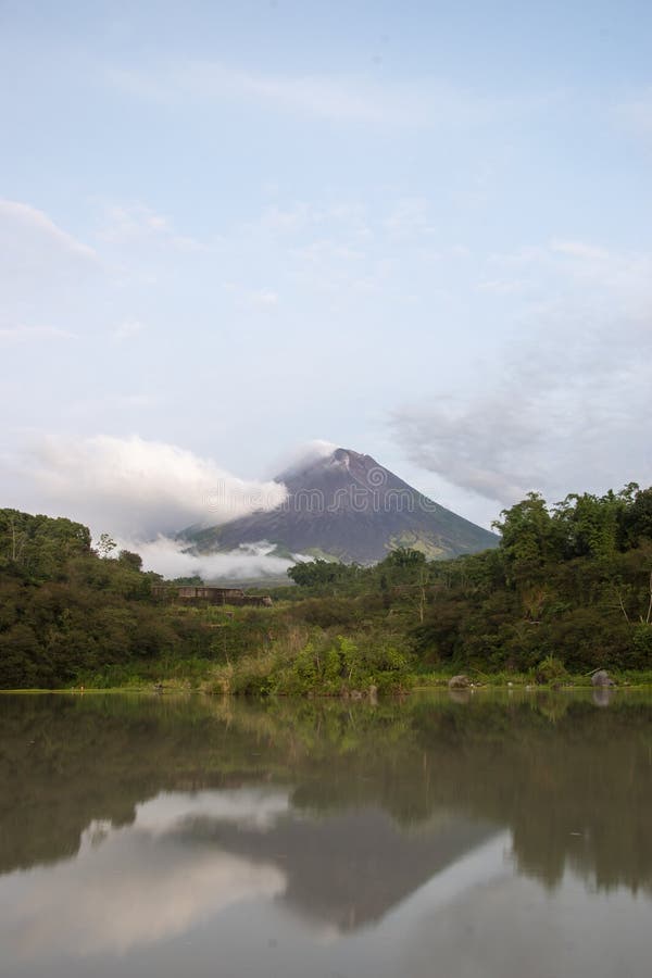 The Reflection of Mount Merapi on the Lake Surface Stock Photo - Image ...