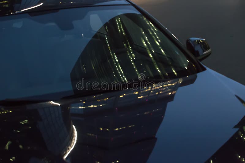 Reflection of Multi-storey Buildings on the Hood of the Car at N Stock ...