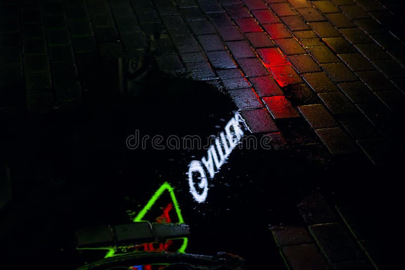 Reflection of Night Lights in Puddle on Sidewalk Stock Photo - Image of ...