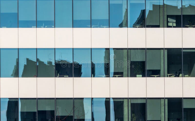 Mirror Image in the Glass of an Office Building Stock Photo - Image of ...