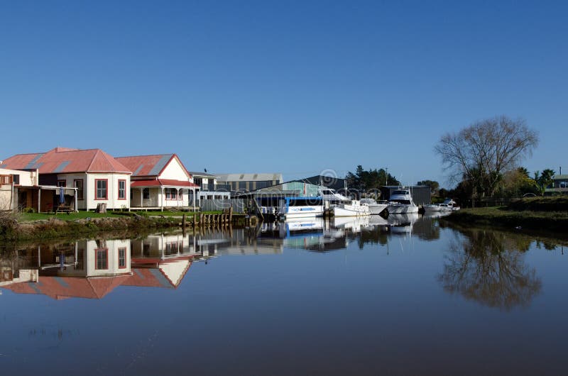 Reflection of Old Ruin Houses on a Awanui River NZ Editorial Image ...