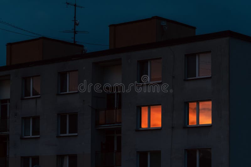 Reflection of Orange Colorful Sky on the Window of Flat Stock Image ...
