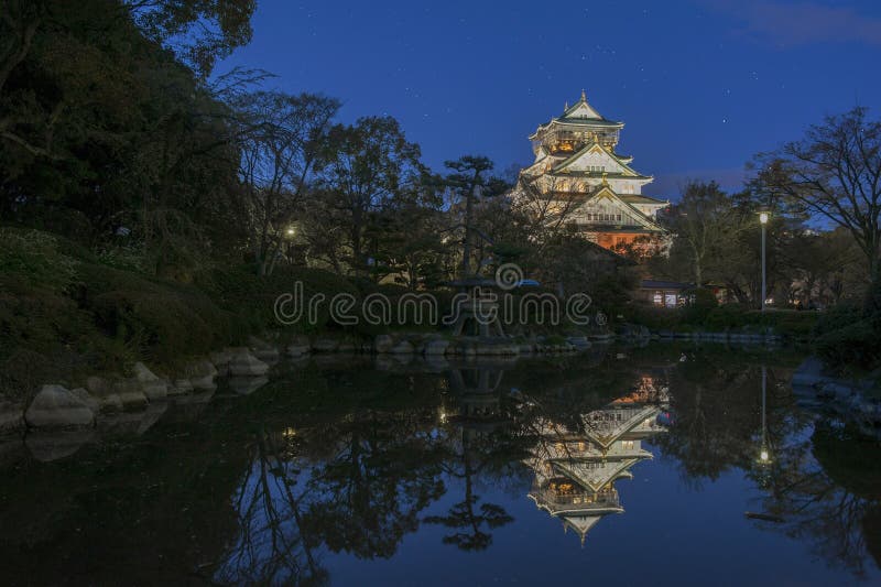 Reflection of osaka castle stock photo. Image of building - 40015386