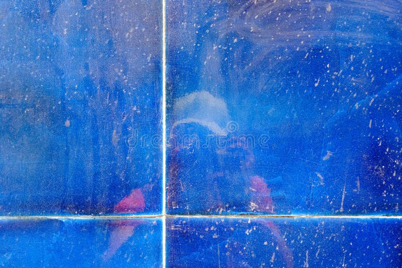 Reflection of a Person with a Photo Camera in the Blue Liquid Ceramic ...