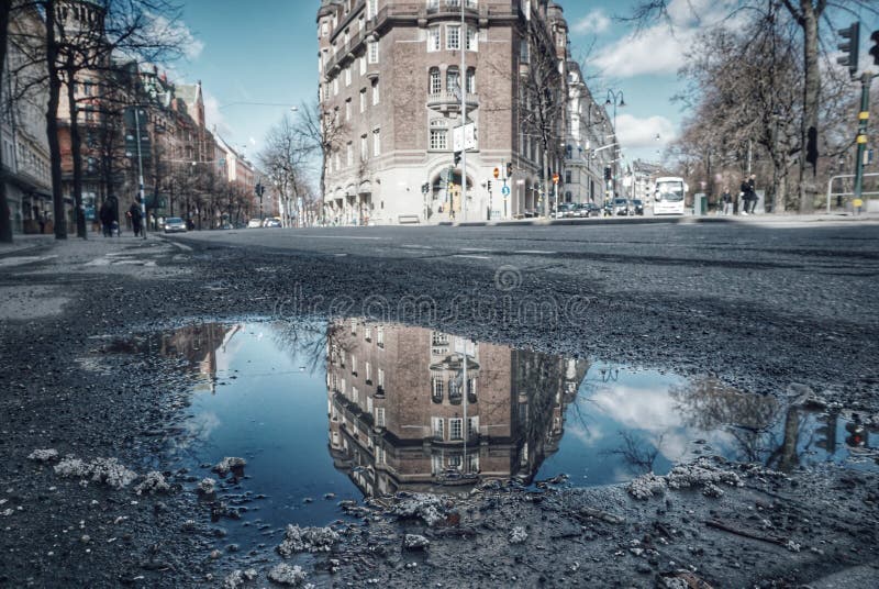 Reflection in Puddle on City Street Stock Image - Image of waterway ...