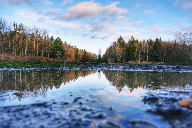Reflection in a Puddle in Front of a Building Editorial Stock Image ...