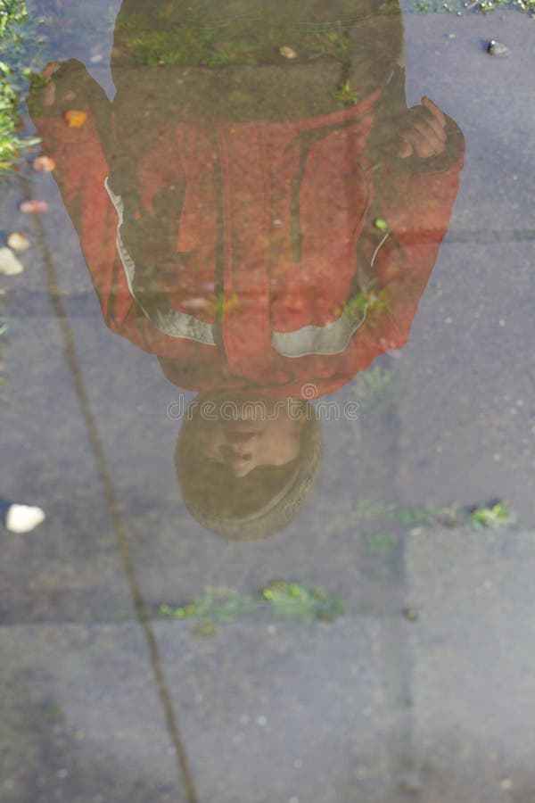 Reflection in puddle. stock photo. Image of outside, blue - 53039408