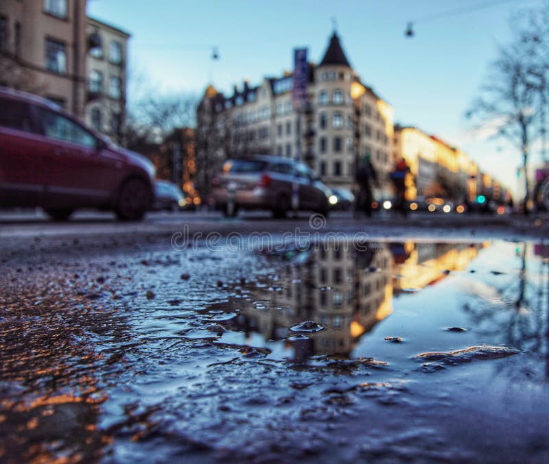 Reflection in Puddle at Street in City Stock Image - Image of snow ...