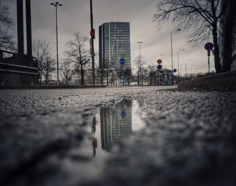 Reflection in Puddles in Holes in the Asphalt Stock Photo - Image of ...