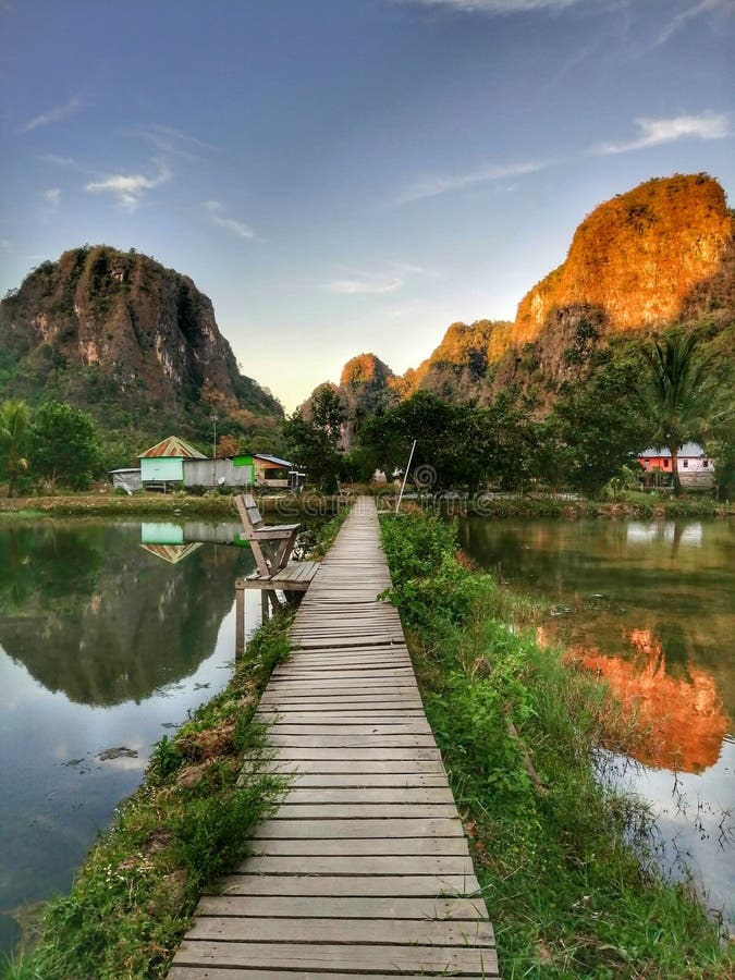 The Reflection of Ramang-Ramang Village Stock Photo - Image of ...