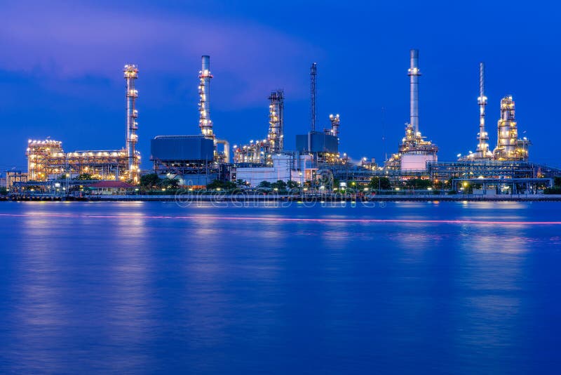 Reflection of a Refinery during Sunset Stock Photo - Image of city ...