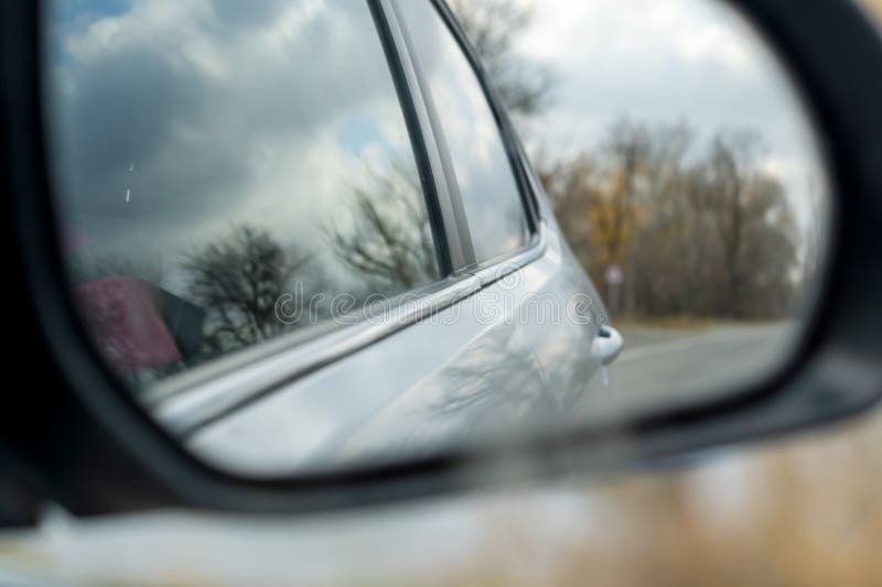 Reflection of the Road in the Rearview Mirror Stock Image - Image of ...