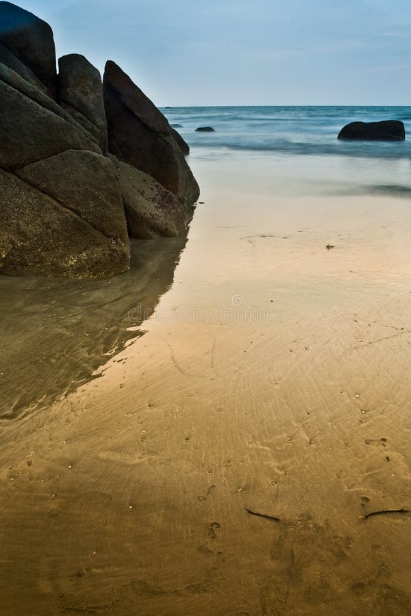 Reflection of Rock on Beach Stock Image - Image of seaside, ocean: 11345473