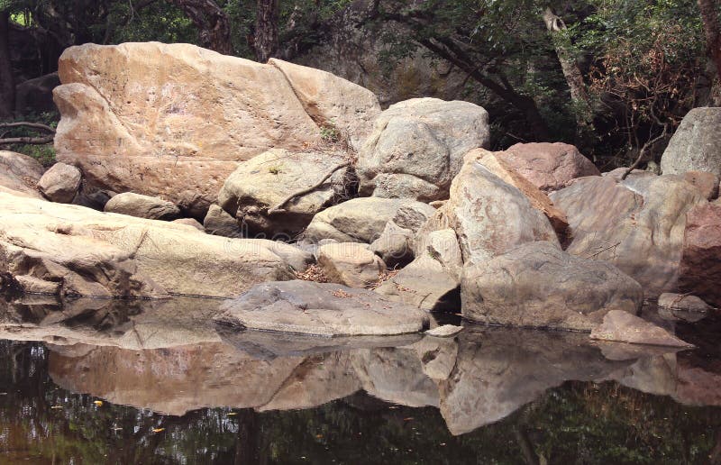 Reflection of rocks stock photo. Image of running, nature - 92931080